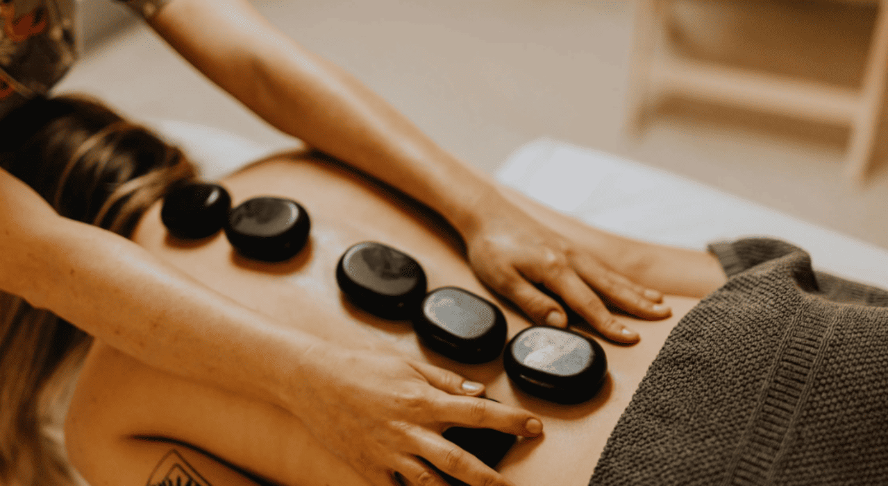 Hot Stone Massage: Benefits & What to Expect - Neuro Massage